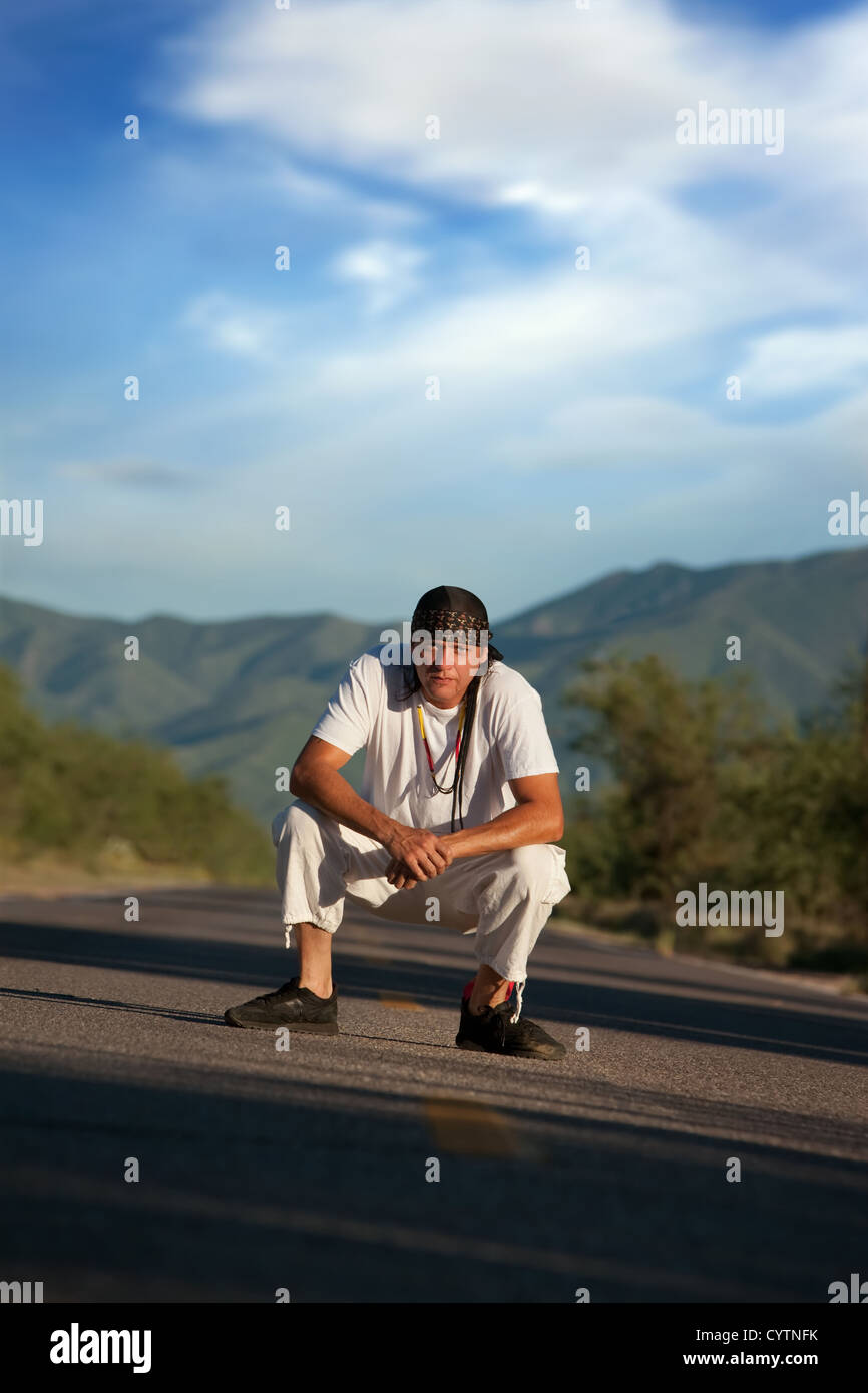 Native American man in the middle of a road Stock Photo - Alamy