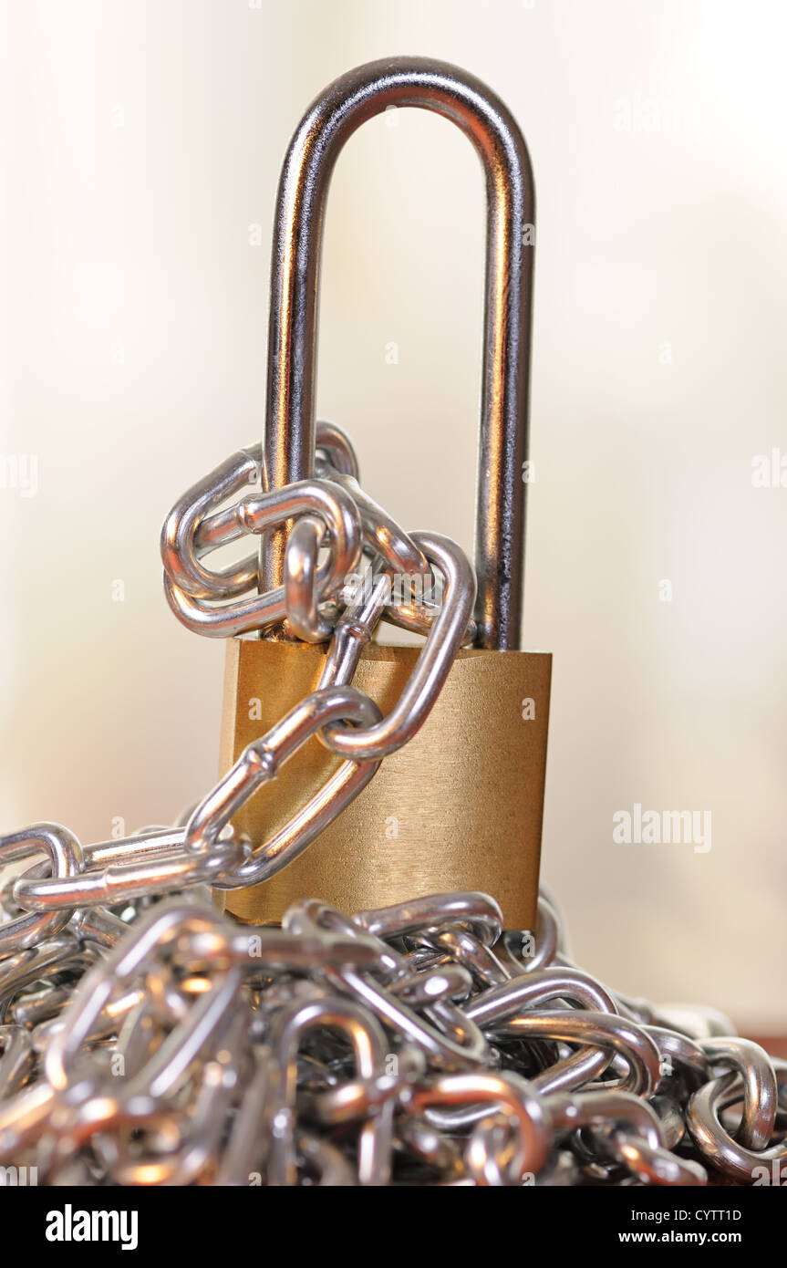 Long chain closed on the padlock Stock Photo - Alamy