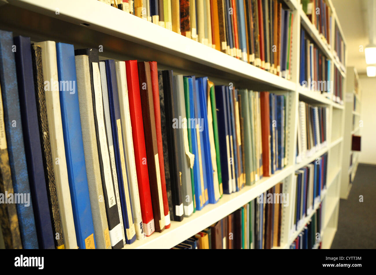 education books in a library showing school or university concept Stock ...