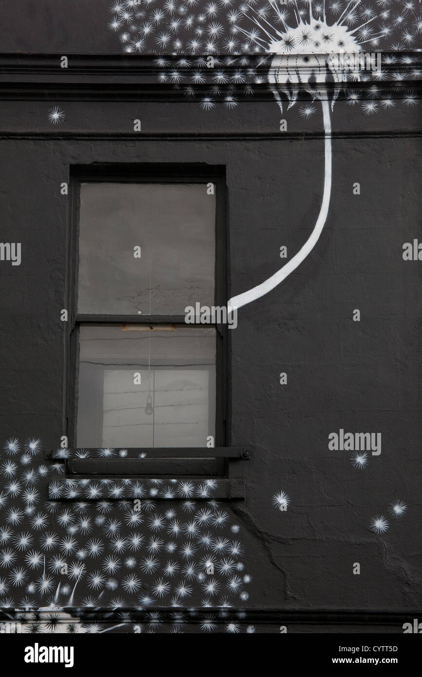 Street graffiti art around Melbourne window in Fitzroy of the passing ...