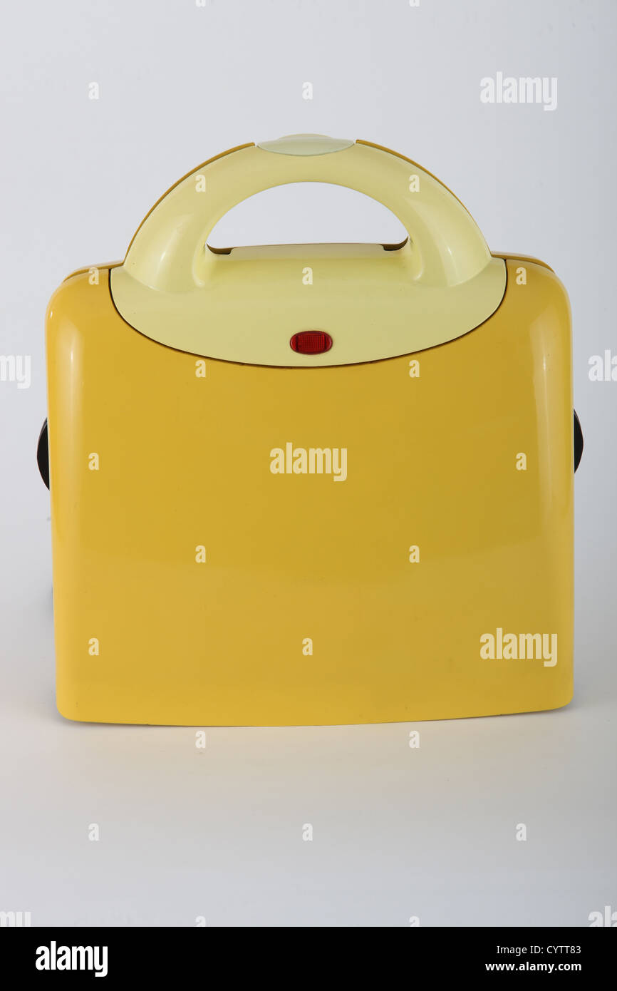 Yellow sandwich maker Stock Photo - Alamy