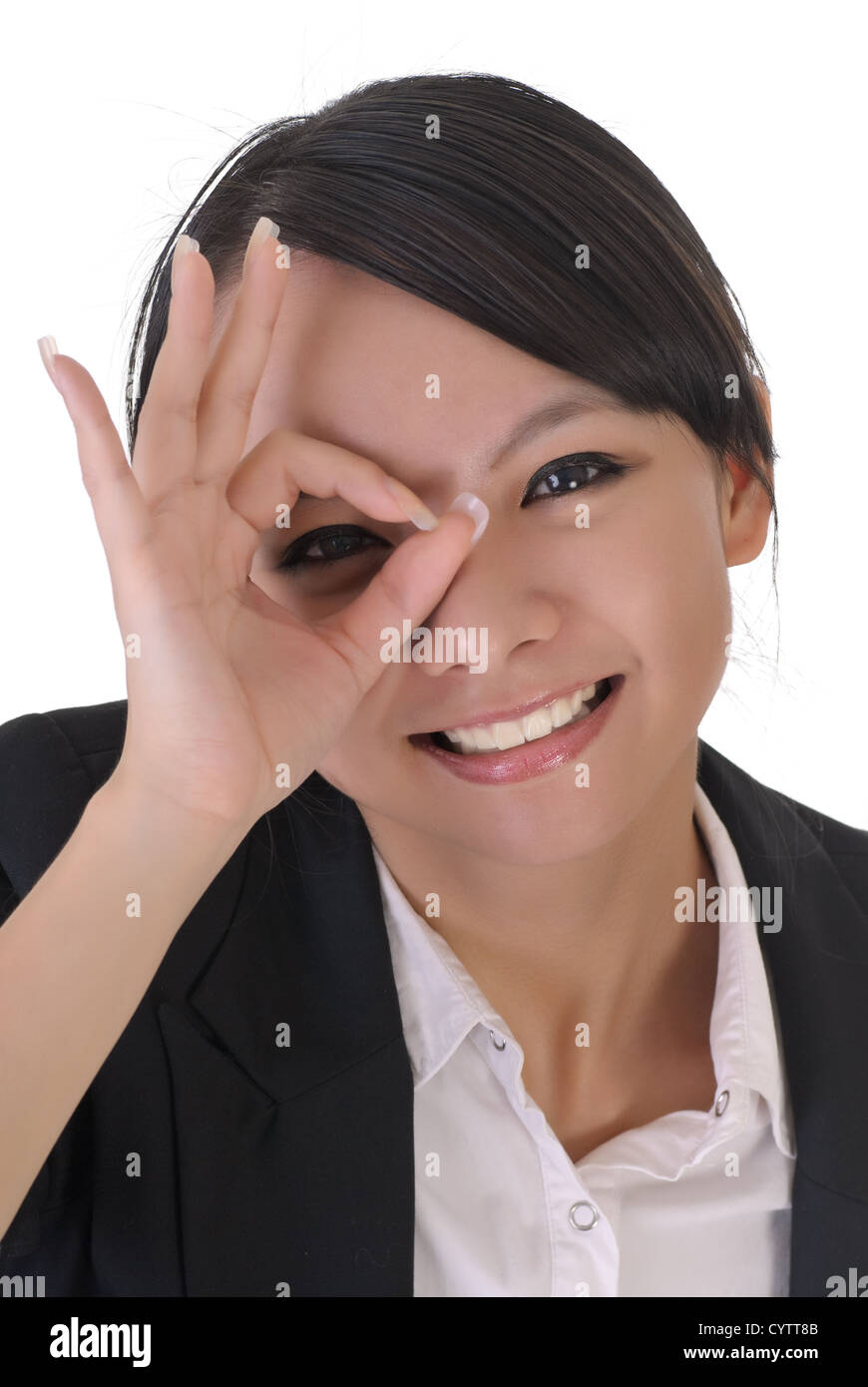 Cute office lady with funny face by put hands on one eye, closeup ...