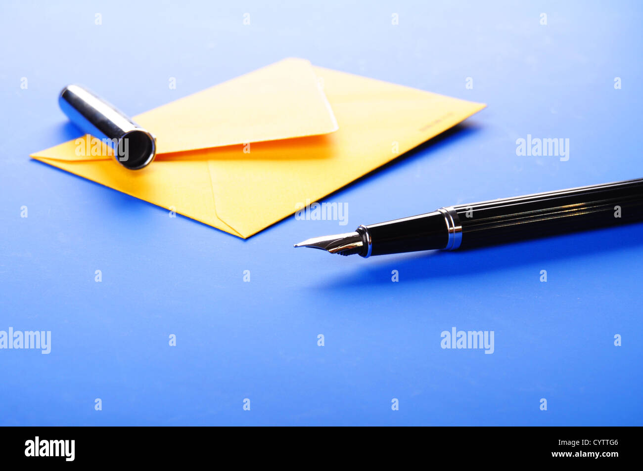 envelop and pen showing mail or communication concept Stock Photo - Alamy