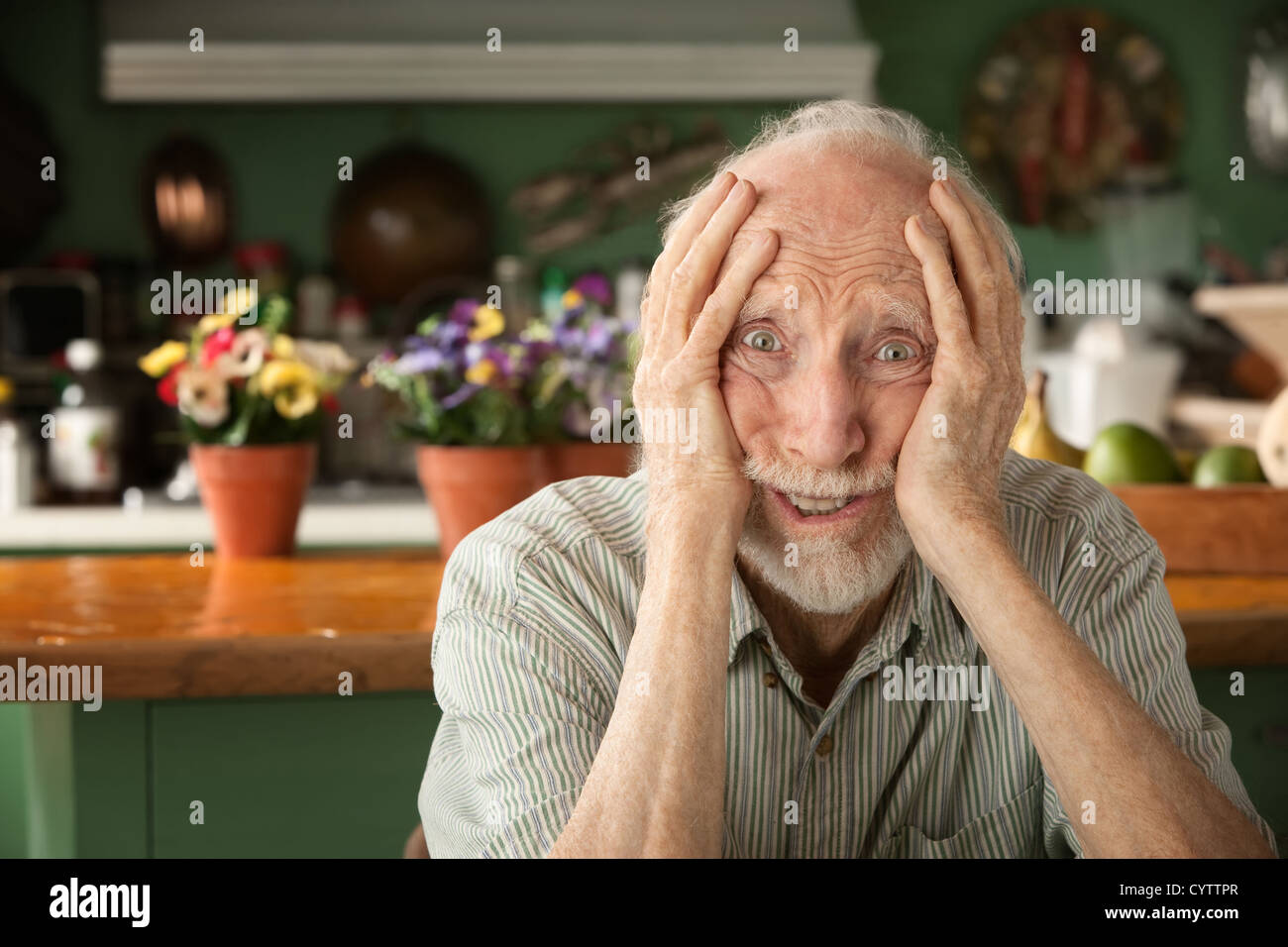 Concerned senior man at home in his house Stock Photo - Alamy