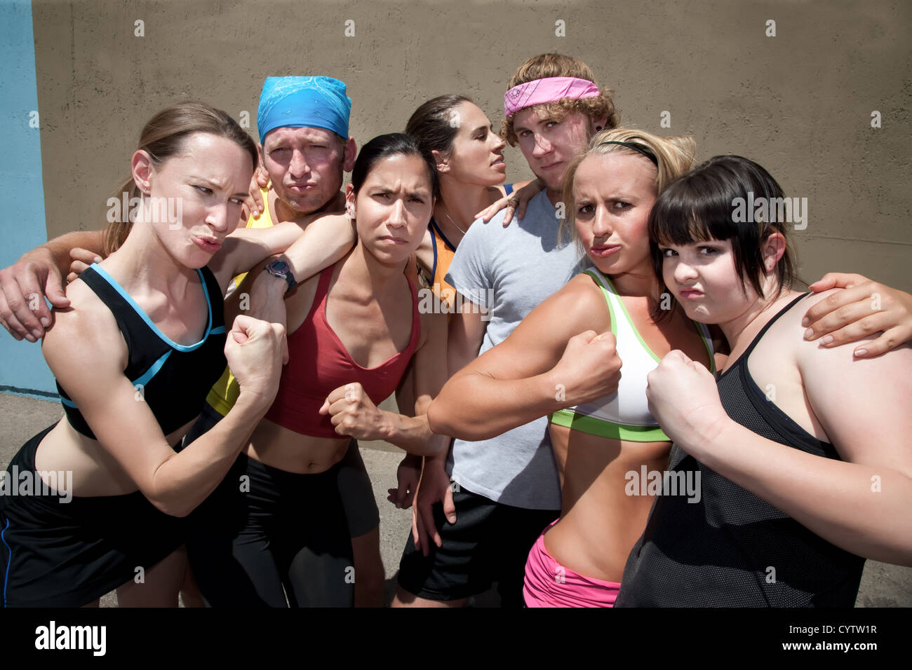 Group of runners pose after a race Stock Photo - Alamy