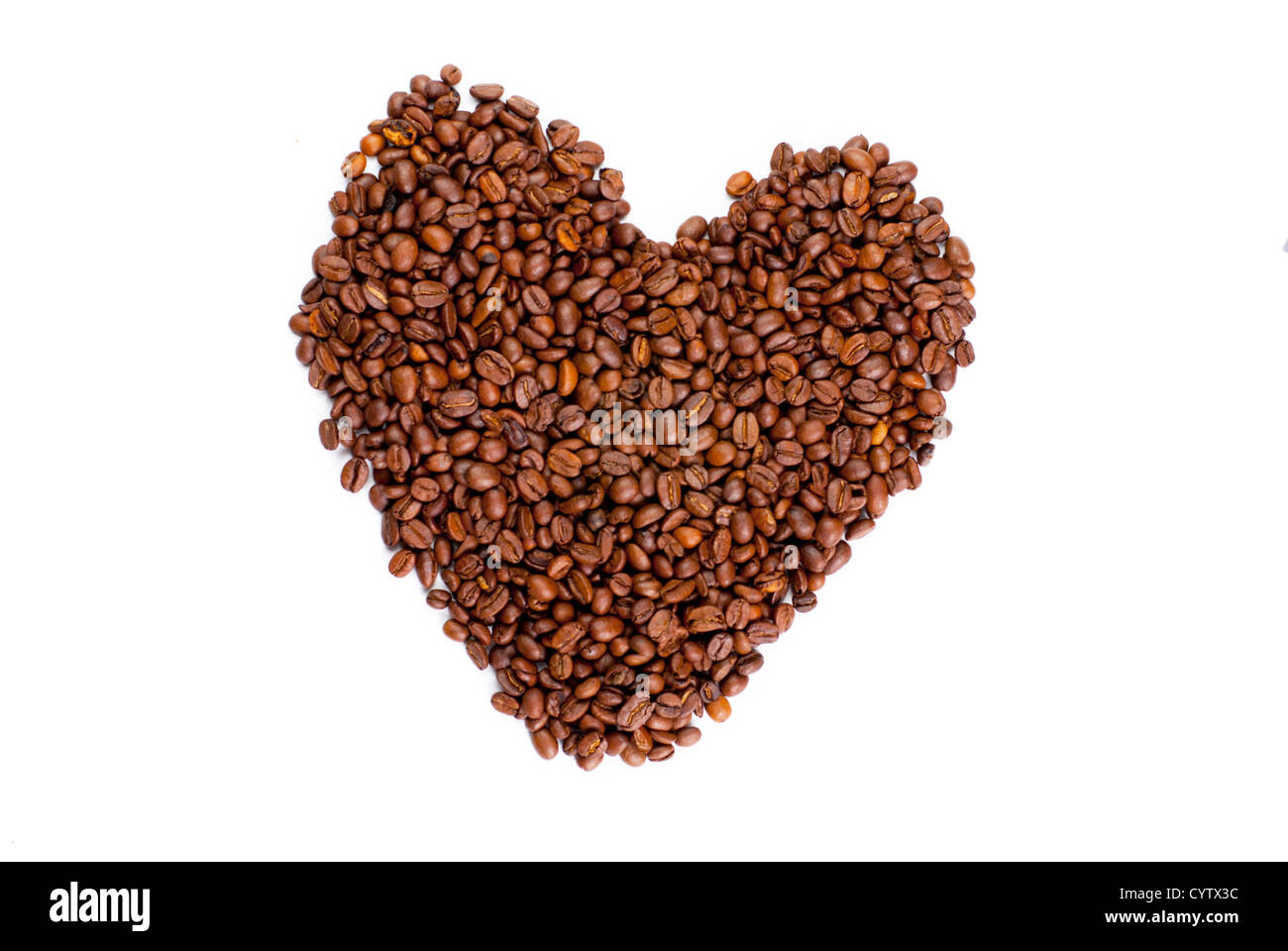 Heart made of coffee isolated on white background Stock Photo - Alamy