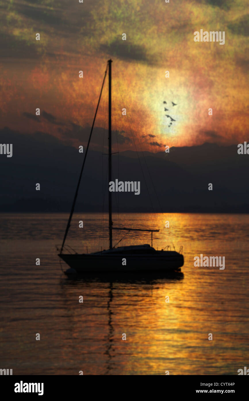 a boat on a lake during sunset Stock Photo - Alamy