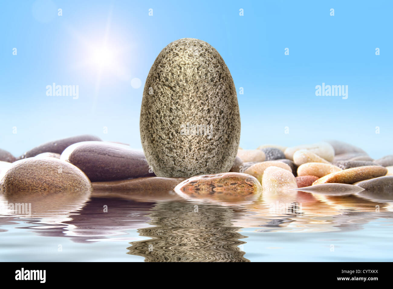 Pile of river rocks on white background Stock Photo - Alamy