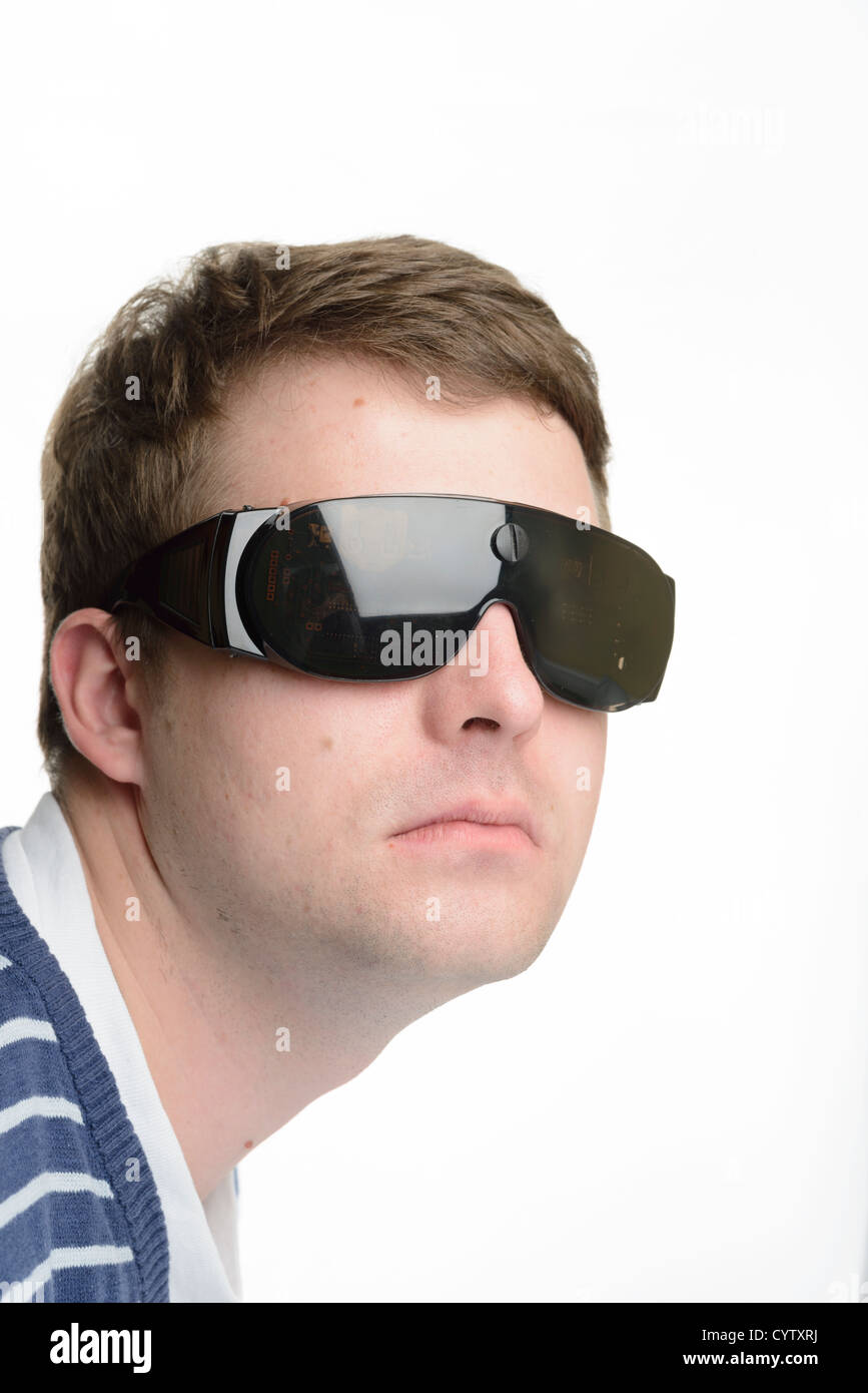 Man wearing futuristic eye glasses hi-res stock photography and images ...