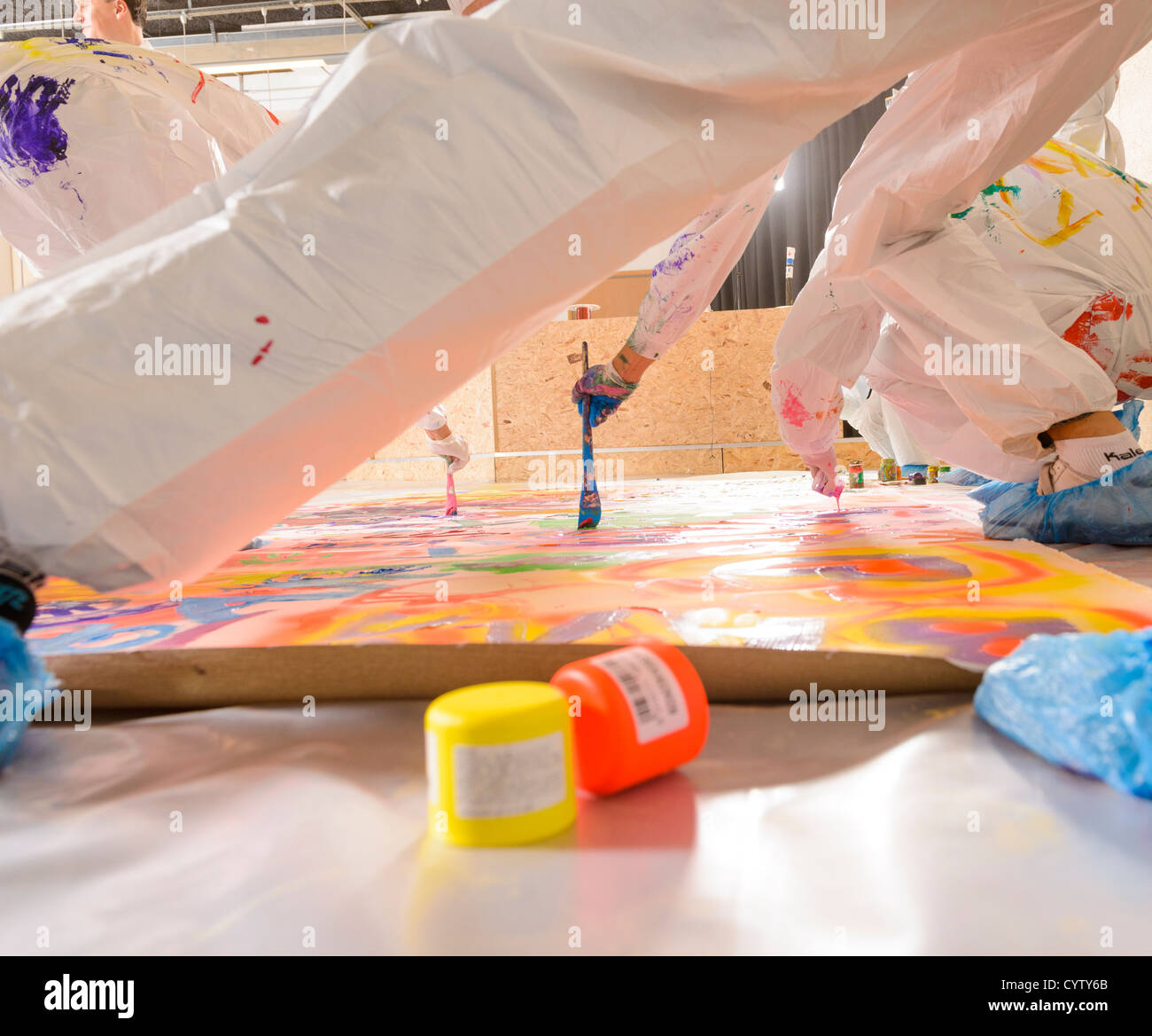 People having fun during art therapy session drawing paint Stock Photo ...