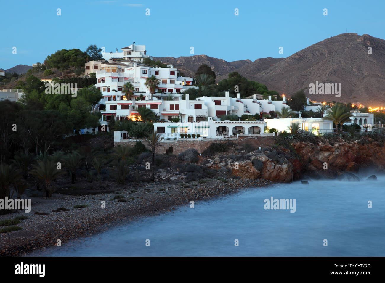 Mediterranean coastline at night. Isla Plana, Costa Calida, Region ...