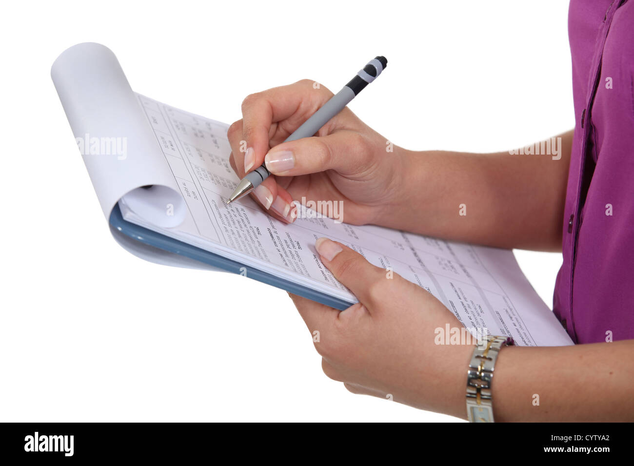 Woman filling in a form Stock Photo - Alamy