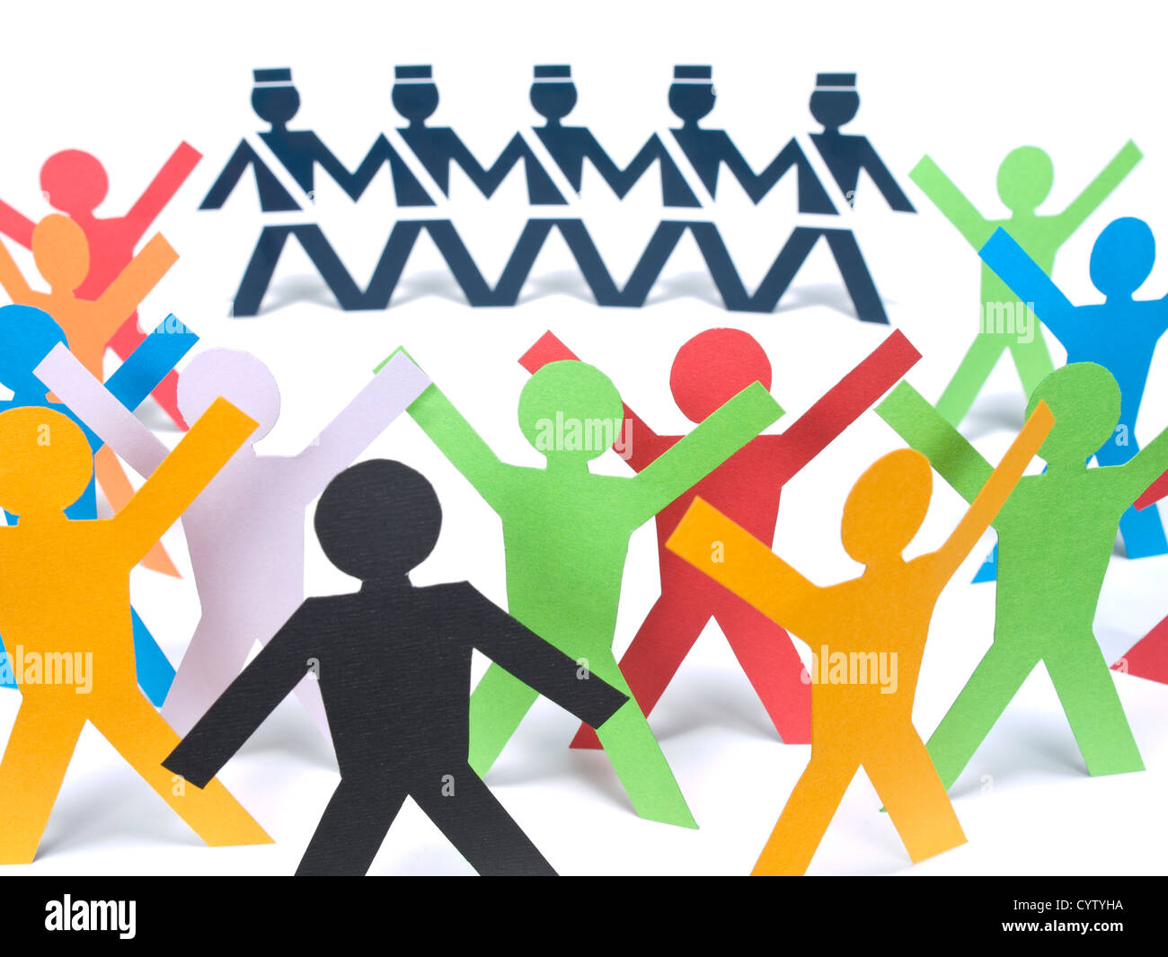 Several color paper figures manifesting before the paper police over a ...