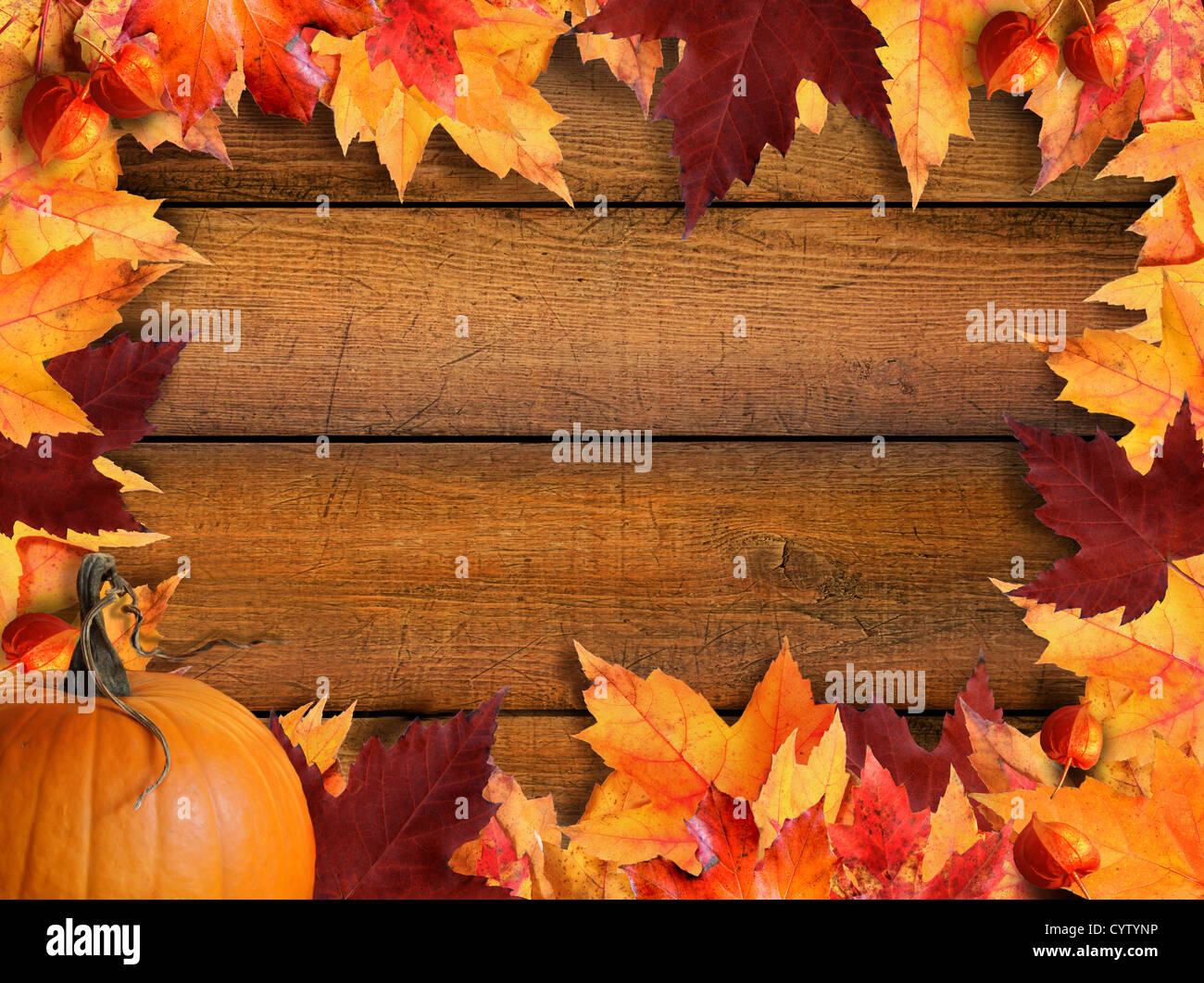 Autumn leaves frame with wood background Stock Photo - Alamy