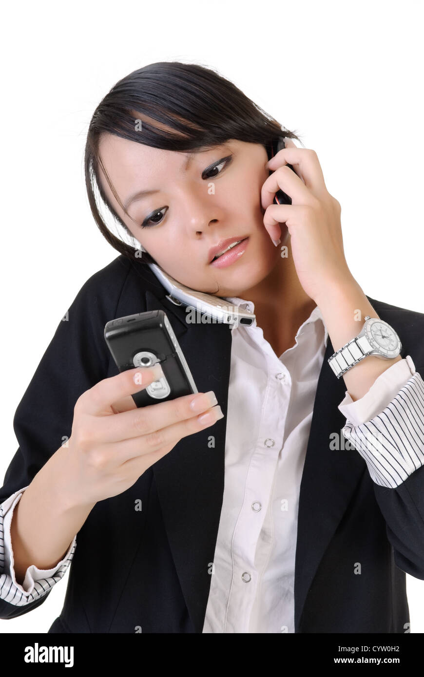 Busy business woman using cellphone and reading SMS, closeup portrait ...