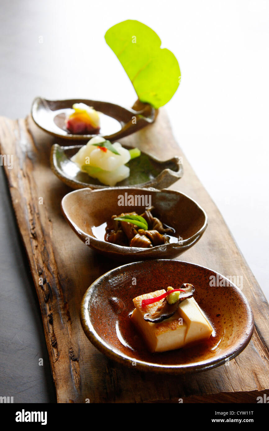 Four dishes of delicate vegetable food Stock Photo - Alamy