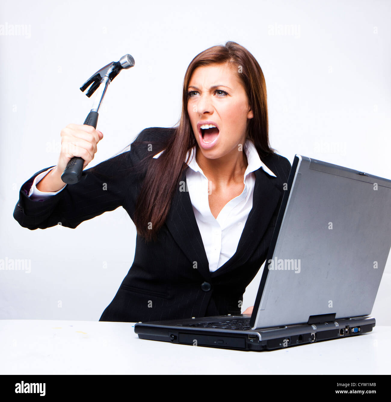 Woman computer problem hammer laptop hi-res stock photography and ...
