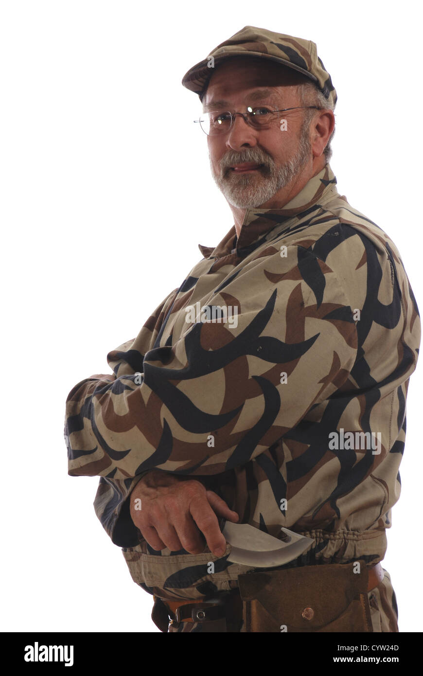 An old hunter holding a knife Stock Photo - Alamy