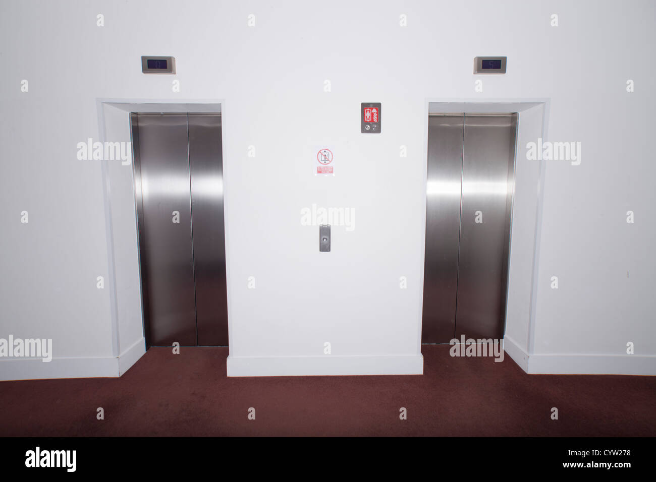 Direction to elevator hi-res stock photography and images - Alamy