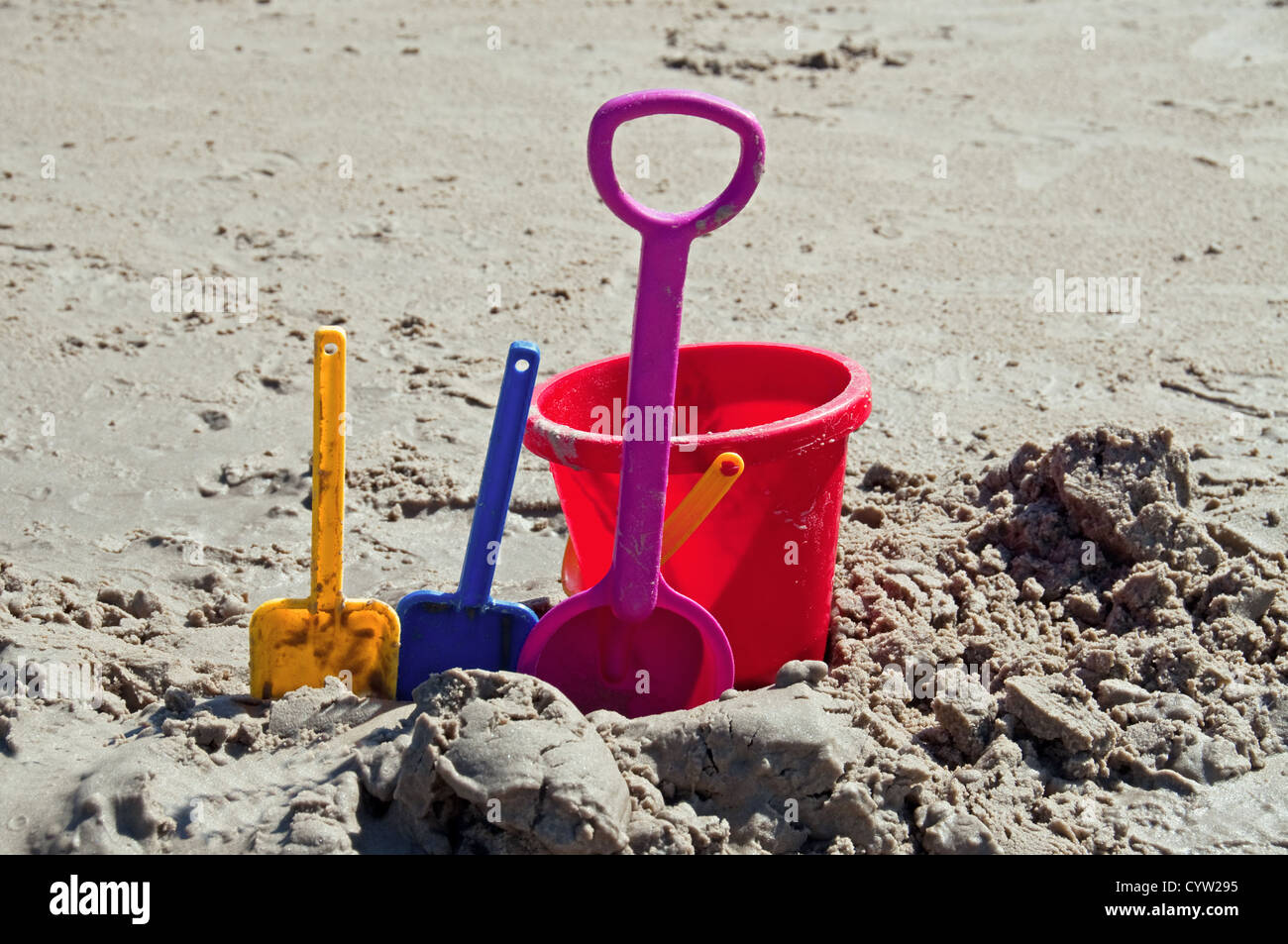 Digging with pink spade hi-res stock photography and images - Alamy