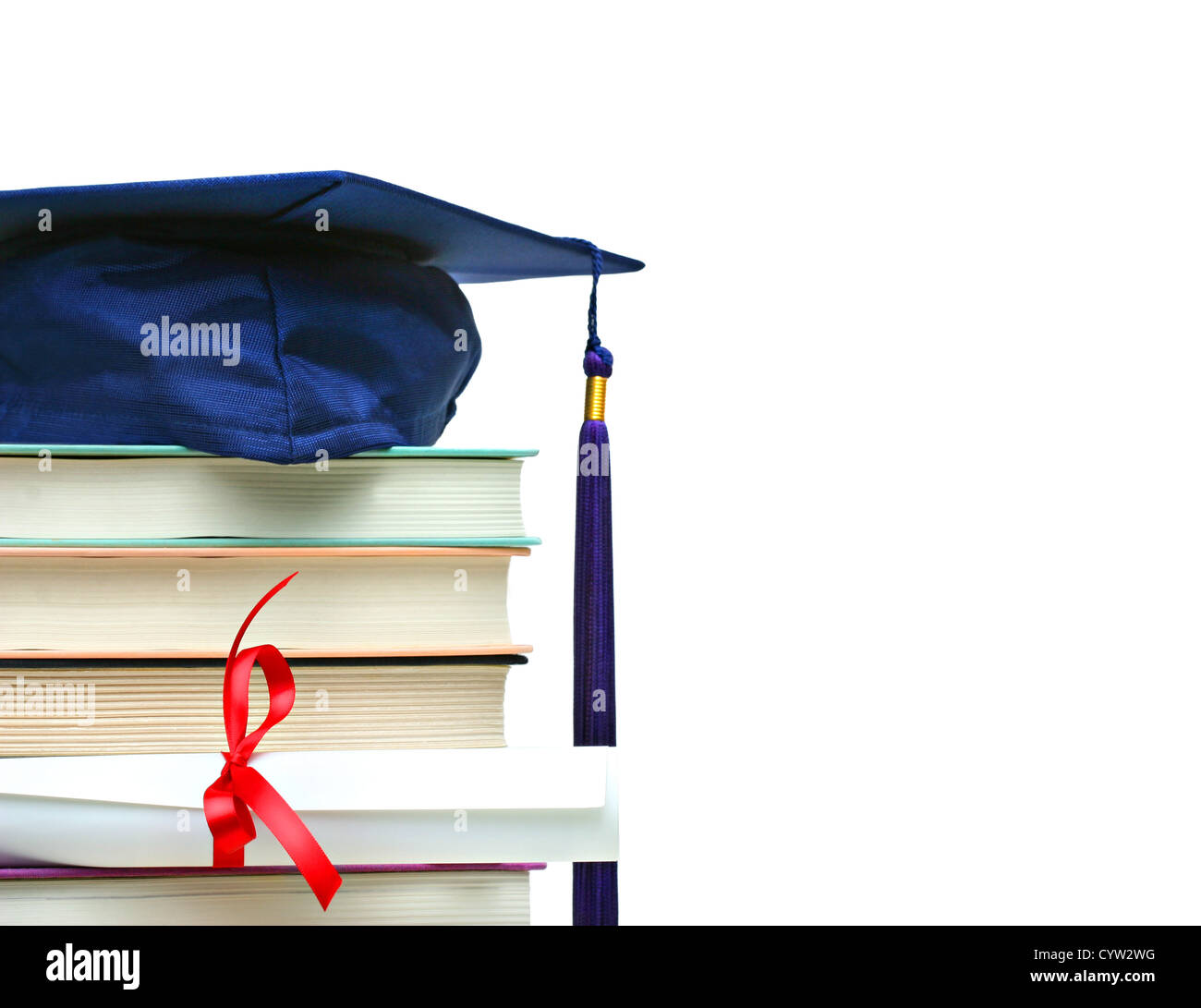 Graduation cap on stack books hi-res stock photography and images - Alamy