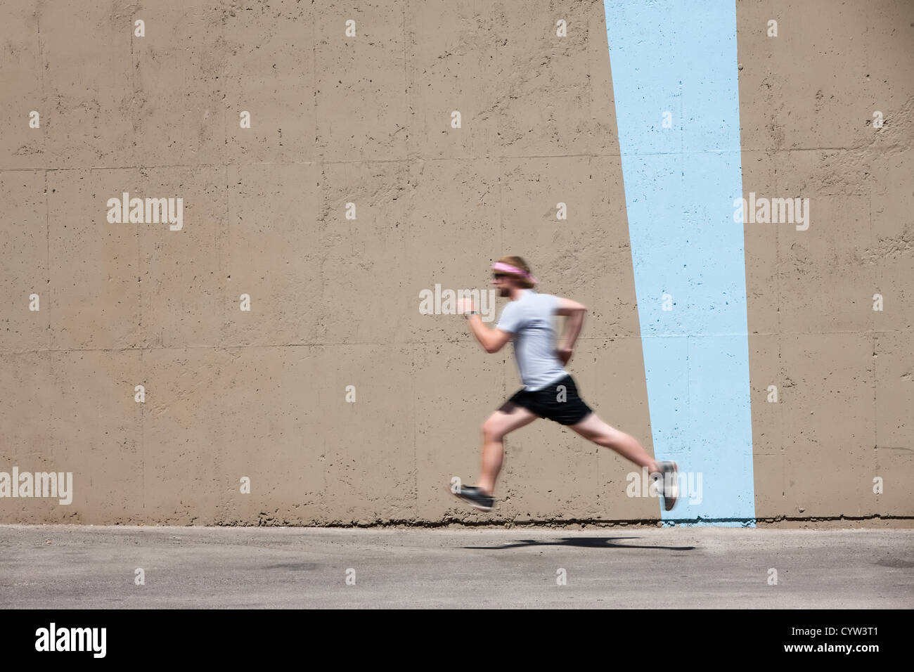 Man runs for fun and exercise Stock Photo - Alamy