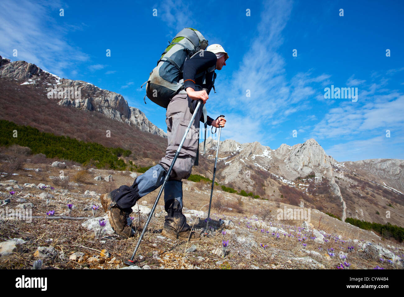 Backpacker in mountains Stock Photo - Alamy