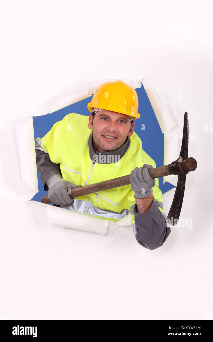 Man with pick-axe Stock Photo - Alamy