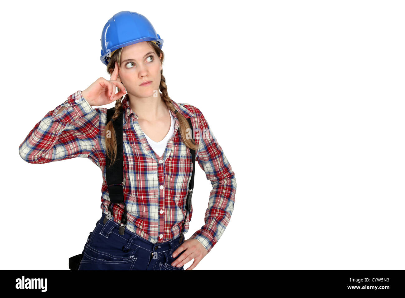 Pensive female builder Stock Photo - Alamy