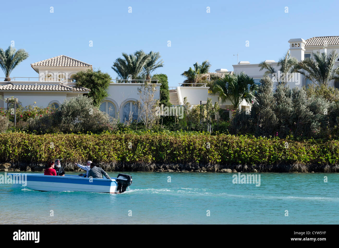boat lagoon river channel motor gondola sea el gouna Stock Photo - Alamy