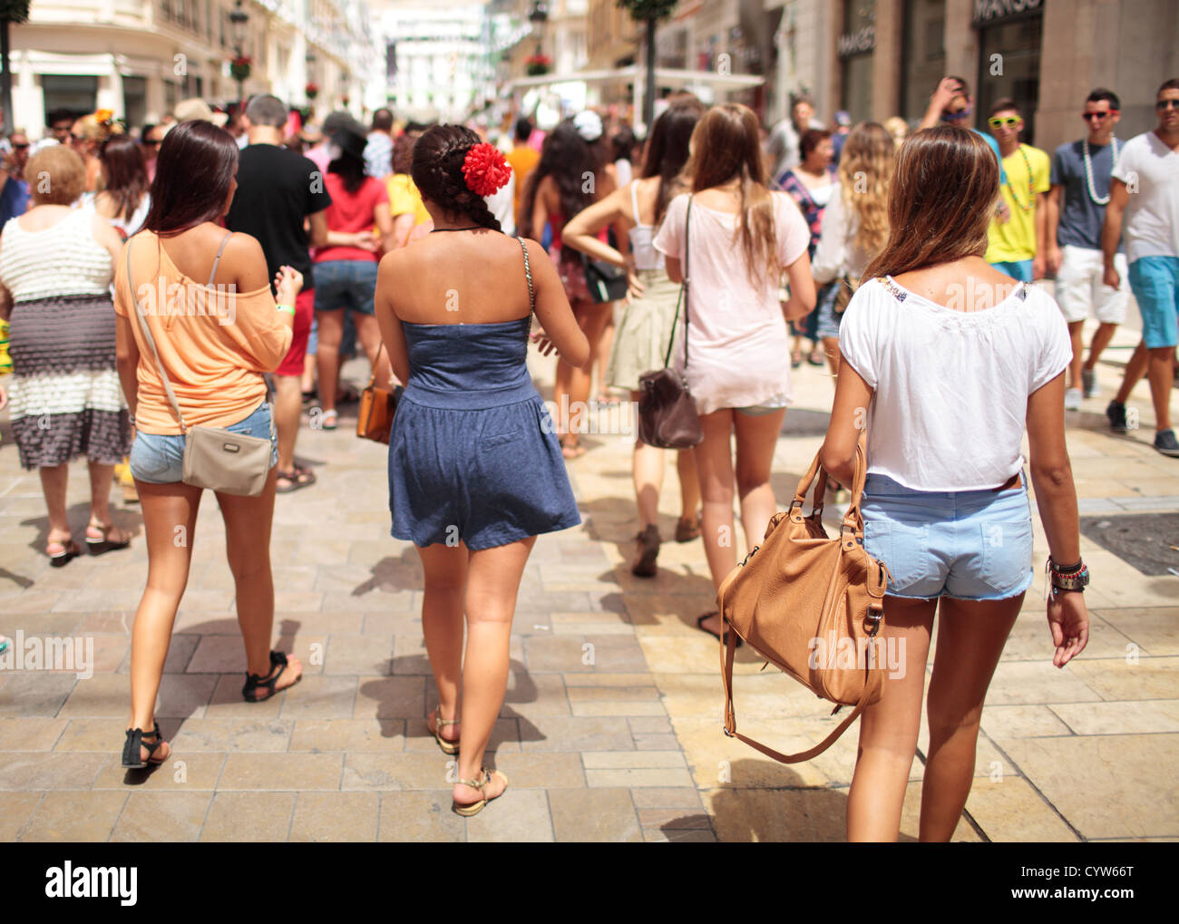 Teenagers enjoying the feria de Malaga in Spain Stock Photo - Alamy