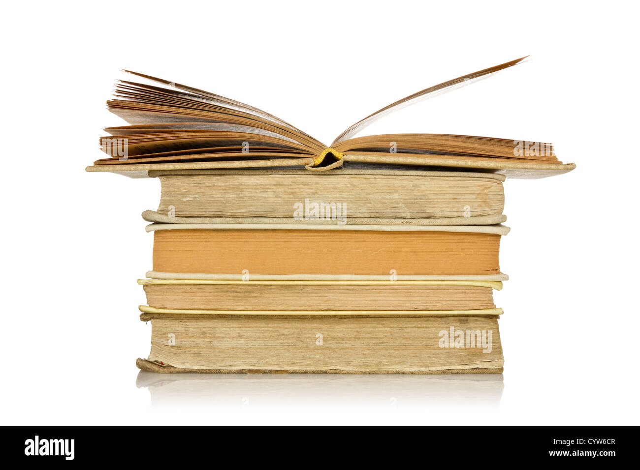 stack of old books with reflection on white background Stock Photo - Alamy