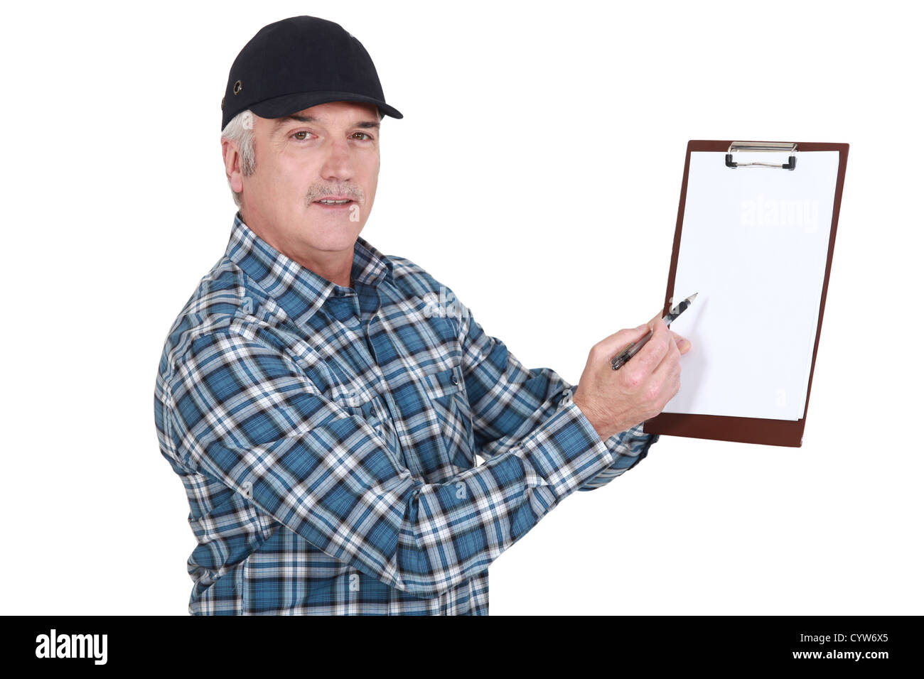 Man holding clip-board and pen Stock Photo - Alamy