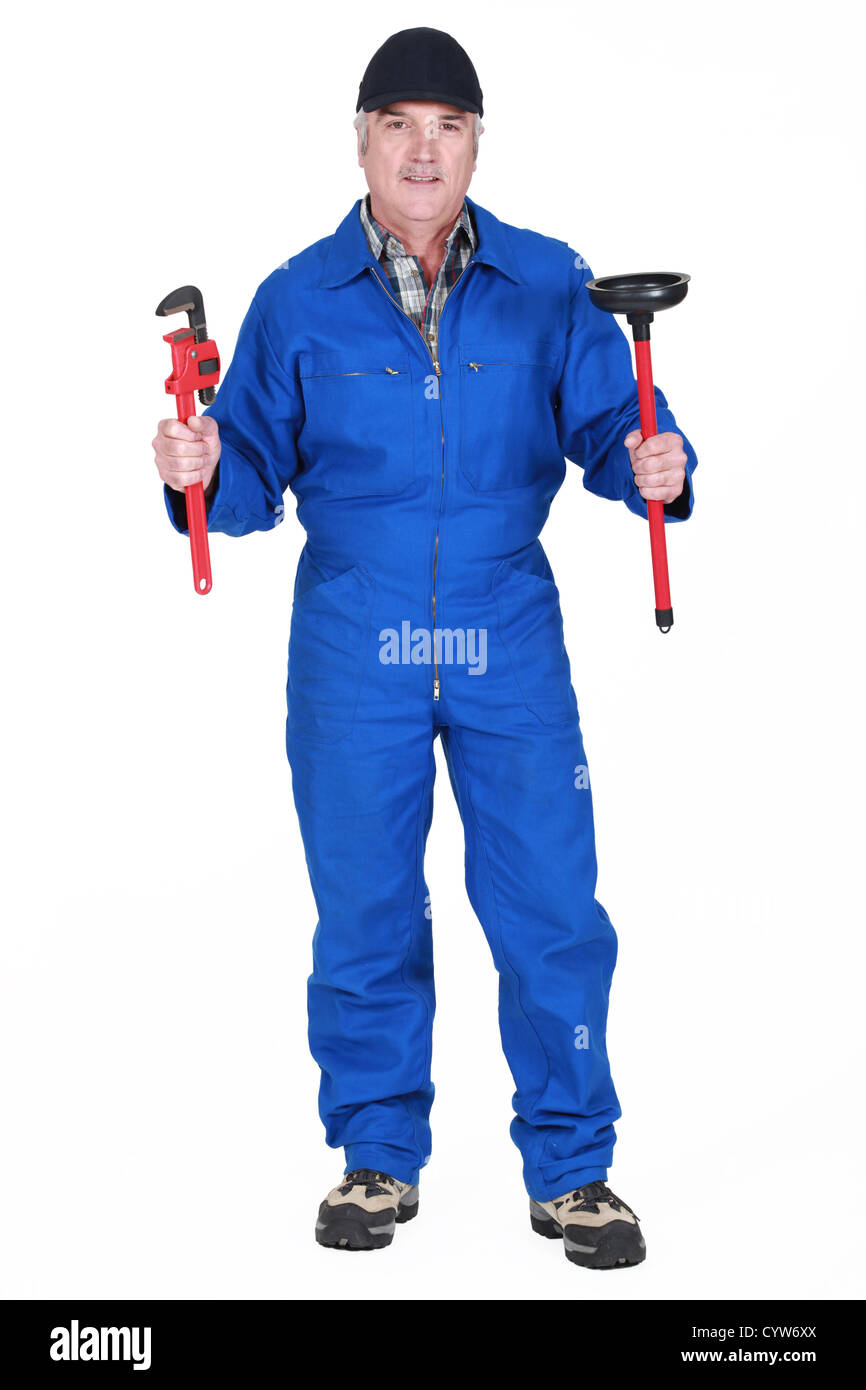 Plumber with wrench and plunger Stock Photo - Alamy