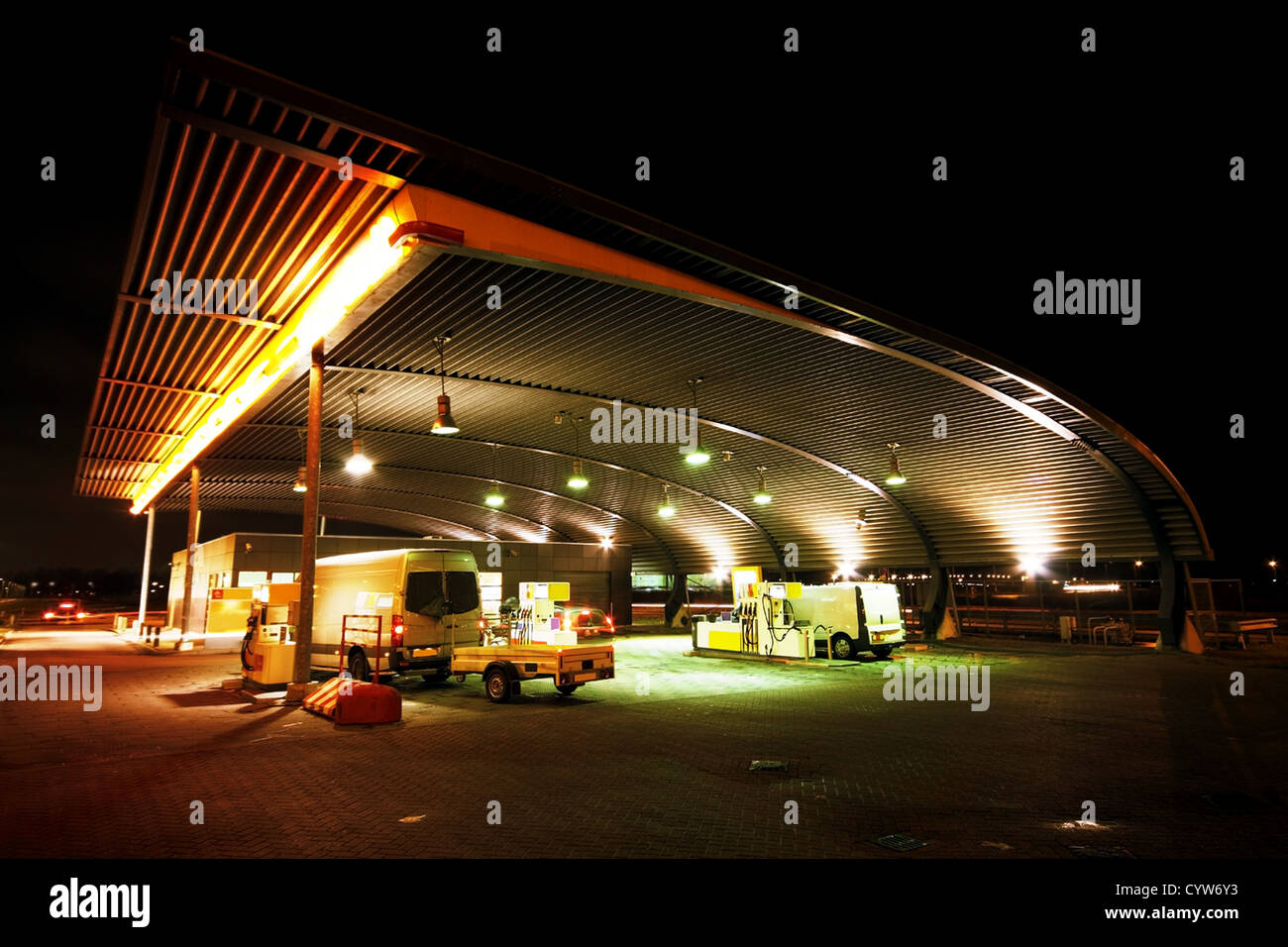 Gas station by night Stock Photo - Alamy