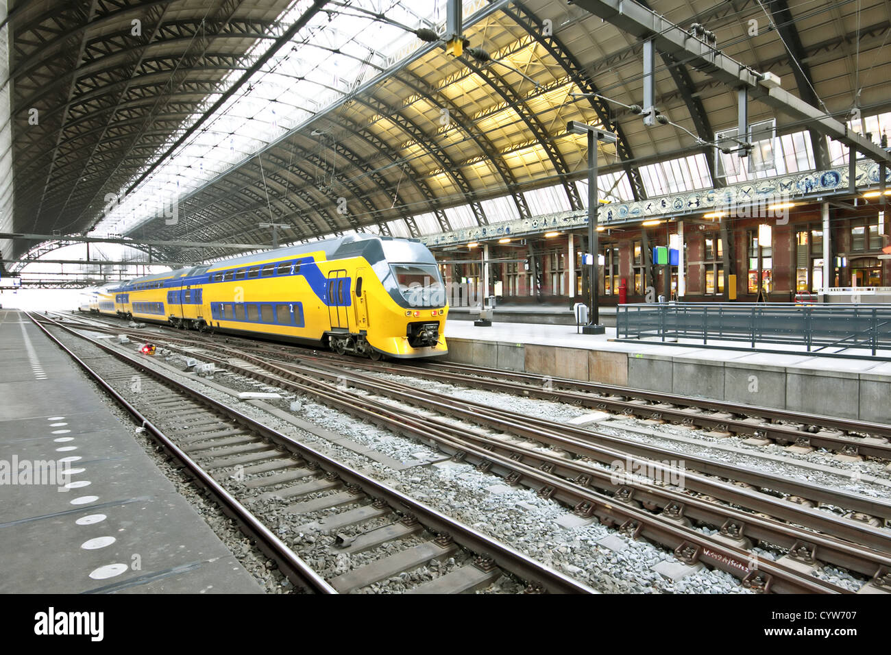 Train arriving at central station in Amsterdam the Netherlands Stock ...
