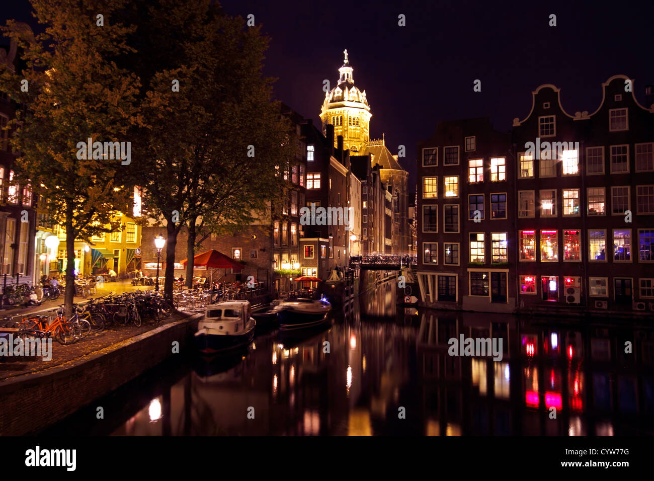 City scenic from Amsterdam in the Netherlands by night with the St ...