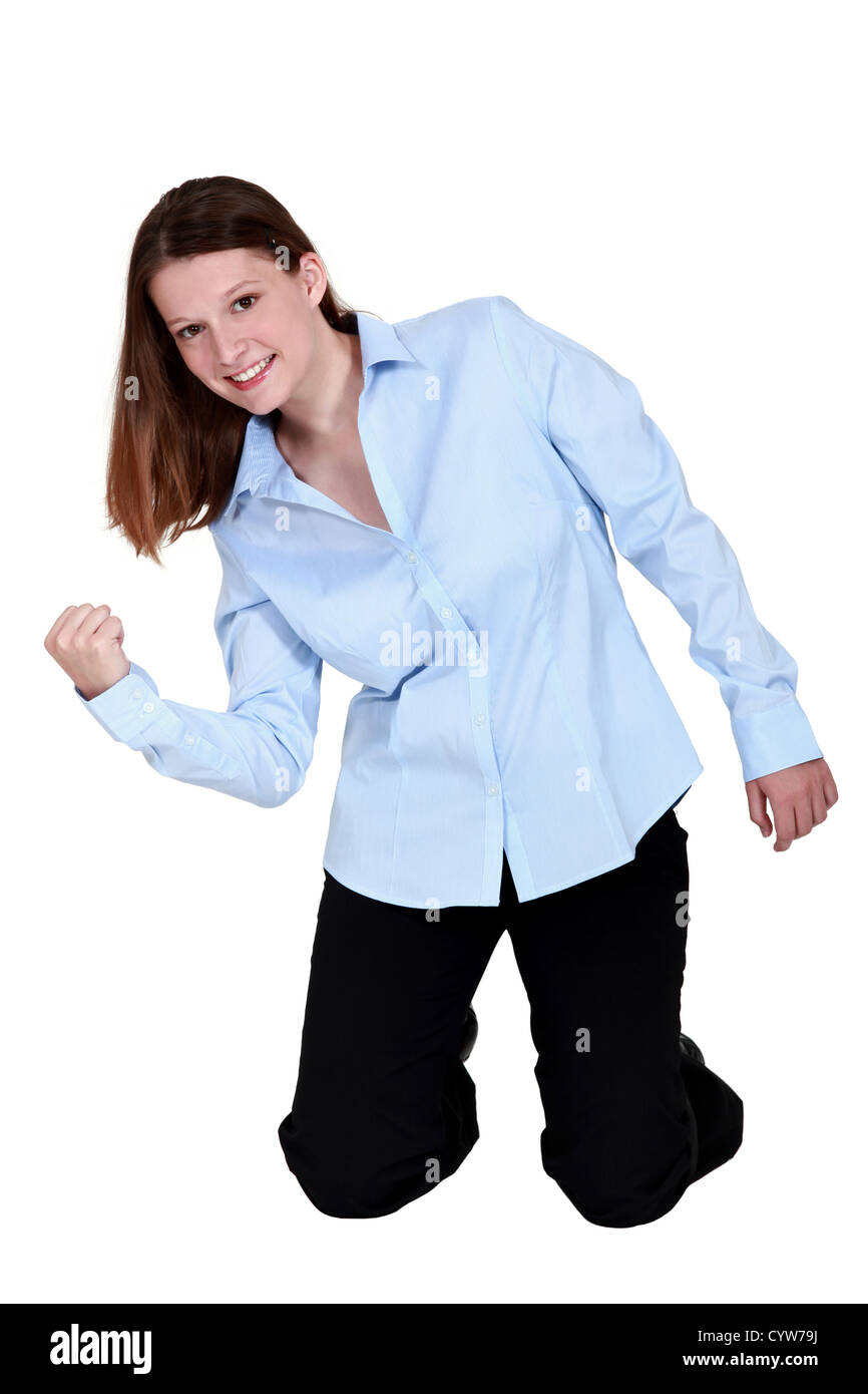 Woman pumping fist in celebration Stock Photo - Alamy