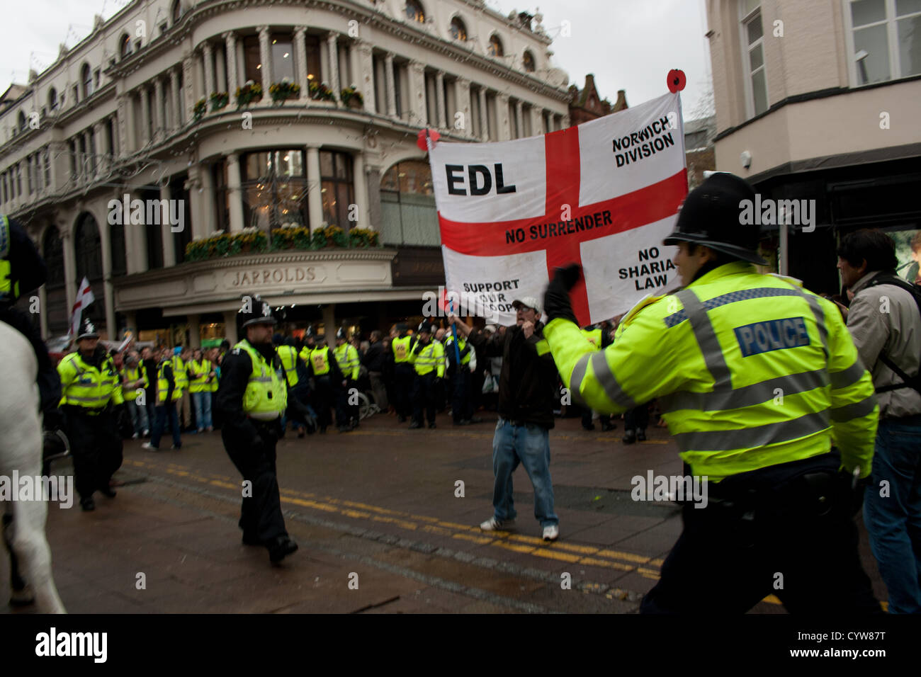 EDL members emerge into the veiw of the apposing protesters Stock Photo ...