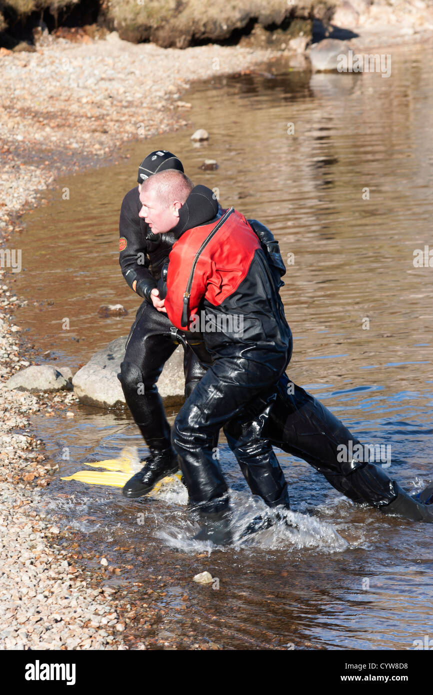 Sub Aqua diving club carrying out a practice rescue and First Aid on ...