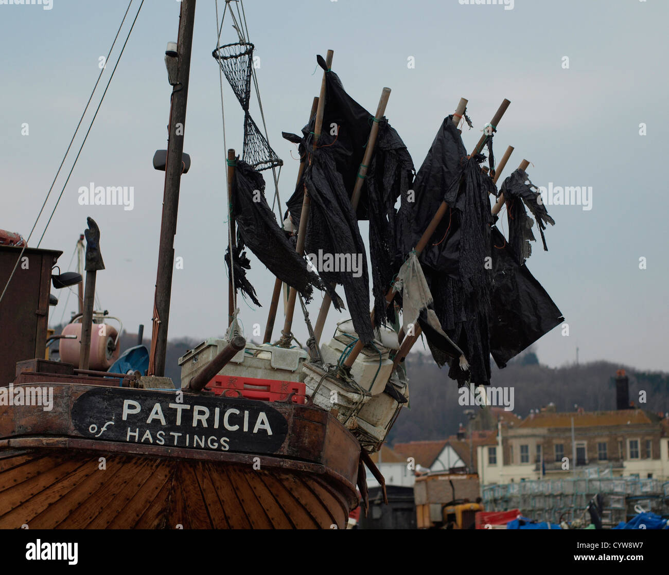 Flags used for fishing in a boat on Hastings beach, UK Stock Photo - Alamy