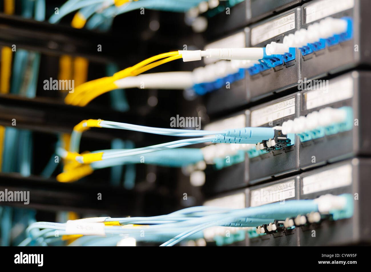 Internet service provider equipment. Focus on panel with optic cables ...