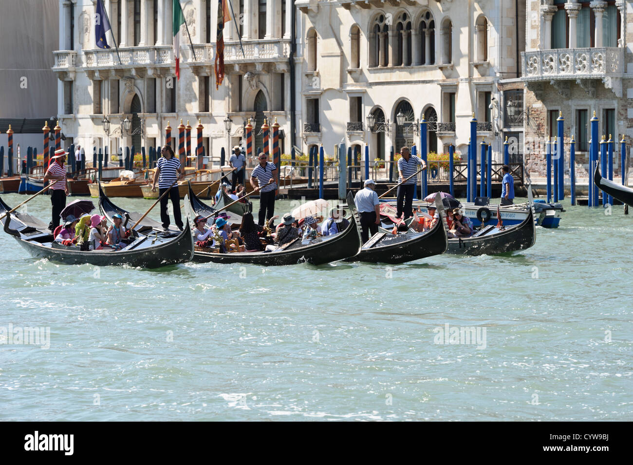 Tourists exploring Venice by gondolas, Venice, Italy Stock Photo - Alamy