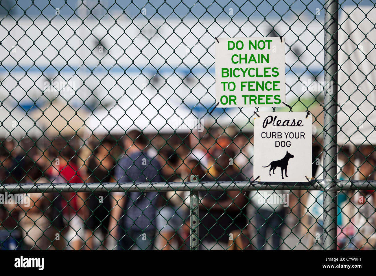 Signs on a fence Stock Photo - Alamy