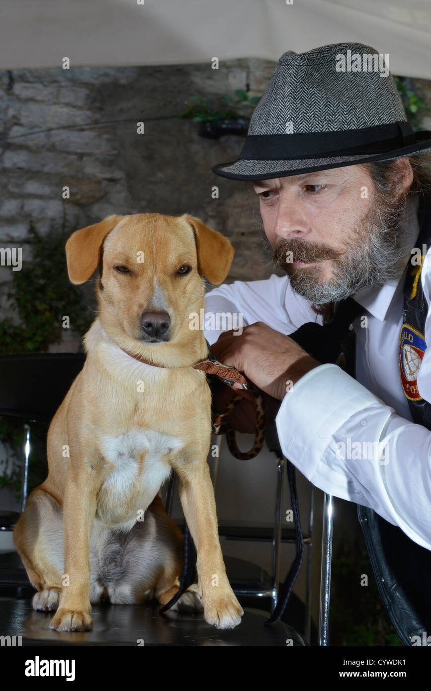 Dog and master Stock Photo - Alamy