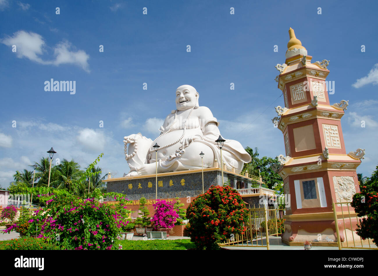 Vietnam, My Tho, Mekong Delta river area. Vinh Trang Pagoda complex, Big Happy Buddha statue ...