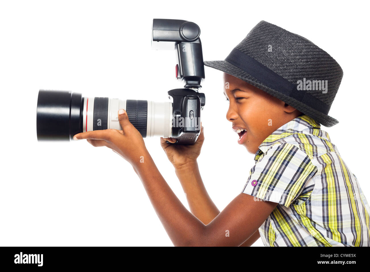 Child boy taking photo with professional camera, isolated on white ...