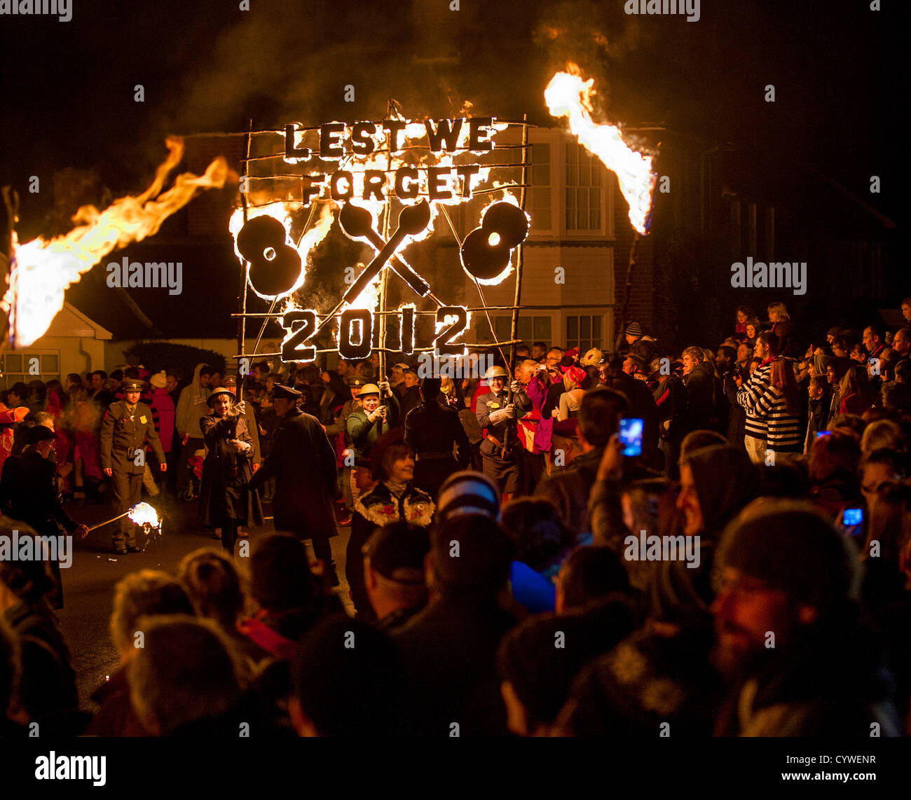 Bonfire procession for Remembrance. Thousands of spectators line the ...