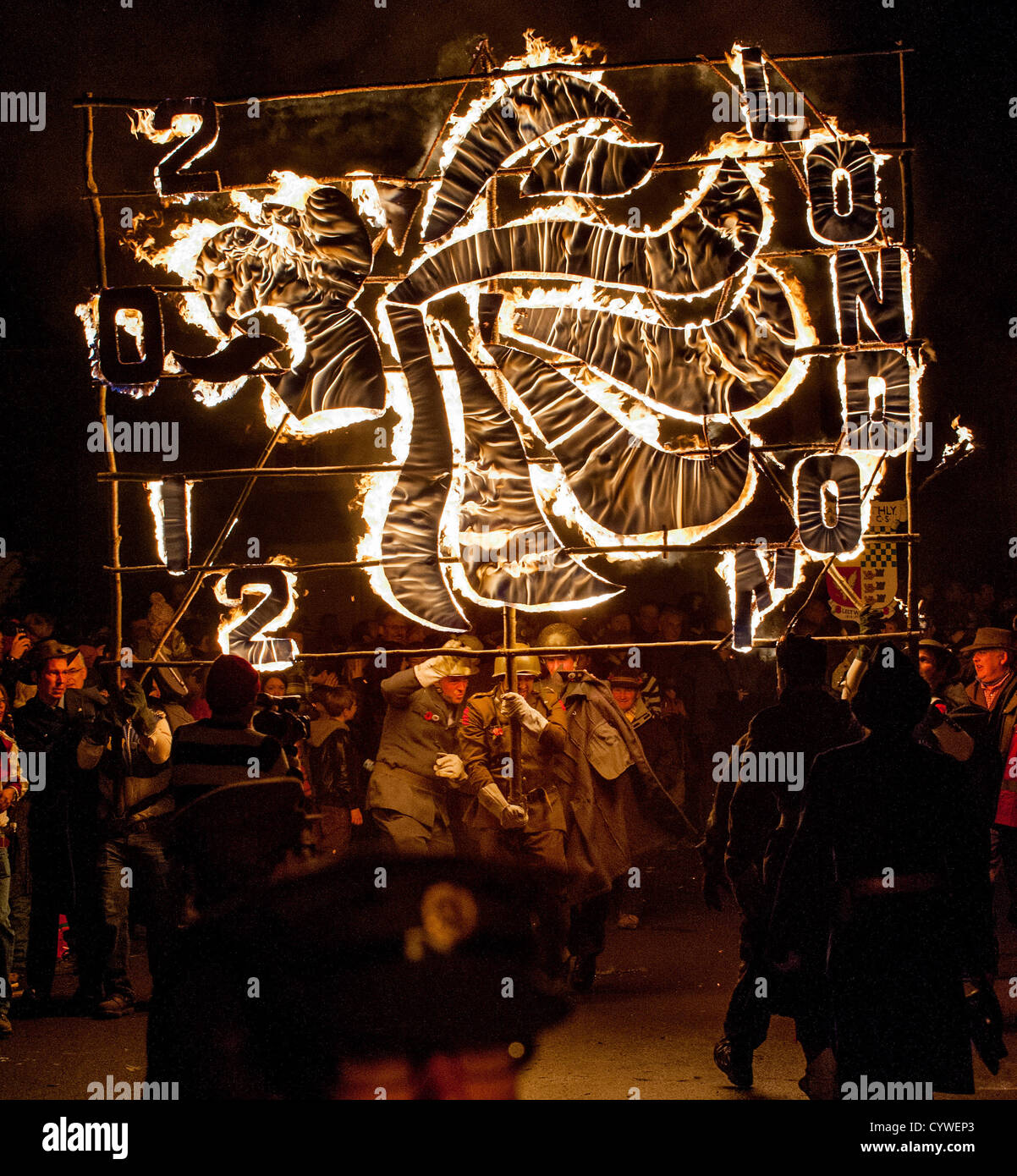 Bonfire procession for Remembrance. Thousands of spectators line the ...