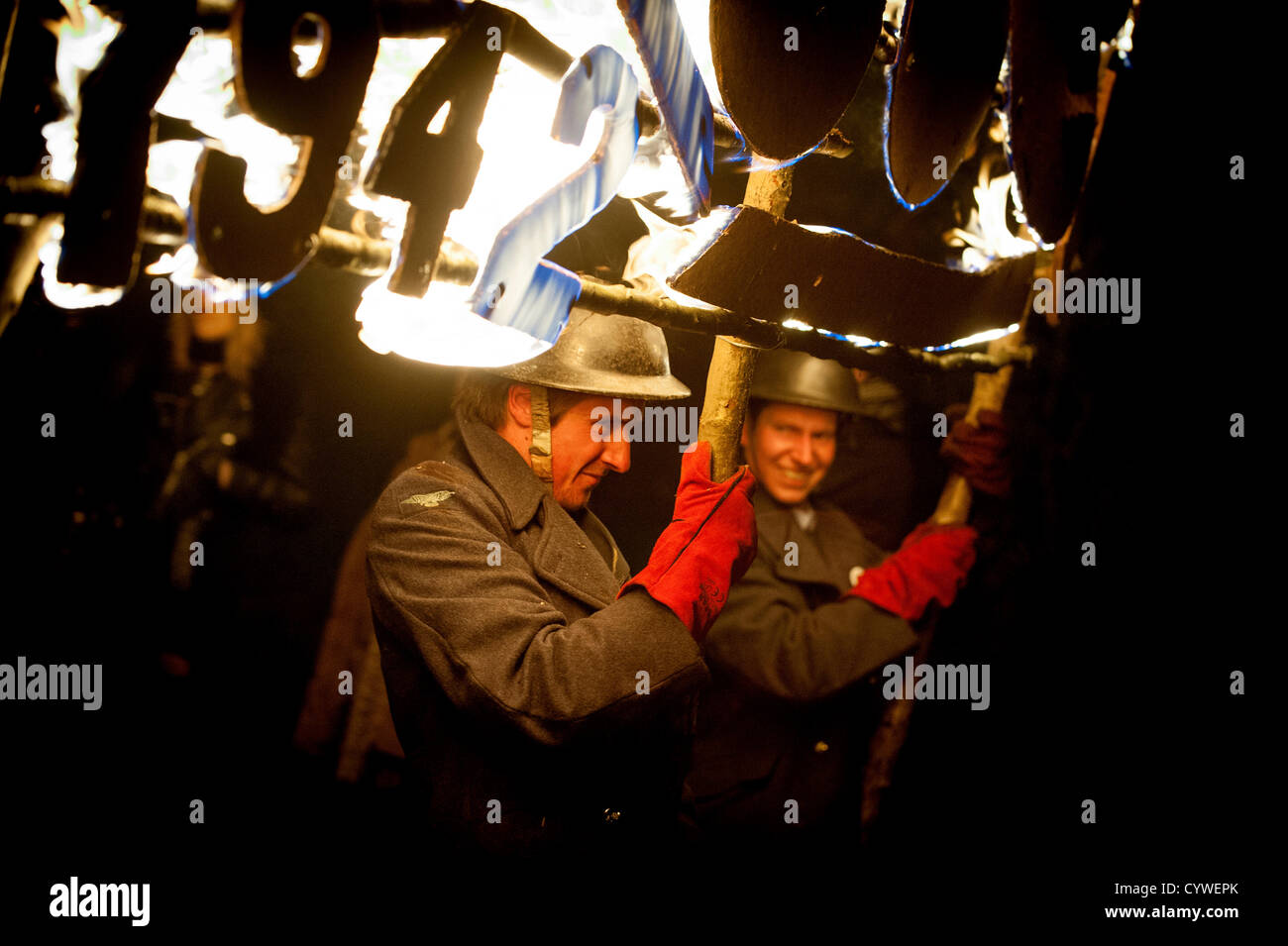 Bonfire procession for Remembrance. Thousands of spectators line the ...